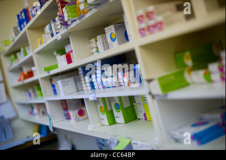 dispensary chemist display shelves of drugs Stock Photo - Alamy