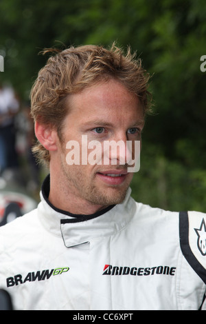 2009 Formula 1 World Champion Jenson Button, slides his kart to the ...