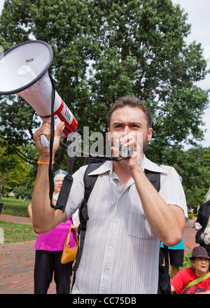 Protester with a bullhorn Stock Photo - Alamy