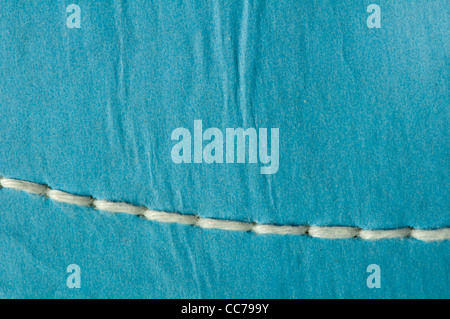 Blue paper texture with seam Stock Photo - Alamy