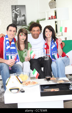 Italian soccer fans celebrate team's victory as they watch on a giant ...