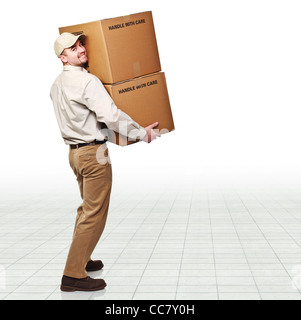Young handsome man with fragile box ordered from Internet Stock Photo ...