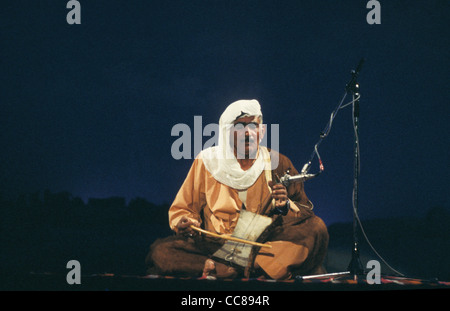 Arab man playing musical instrument Stock Photo - Alamy