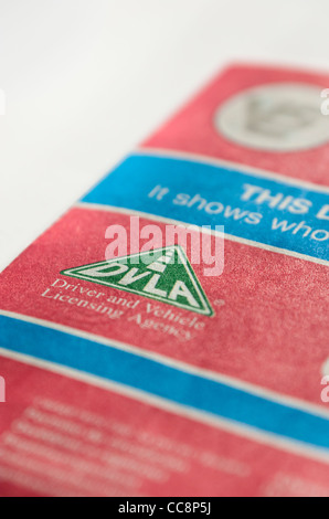 The new red DVLA V5C car registration certificate which replaces the old blue one Stock Photo ...