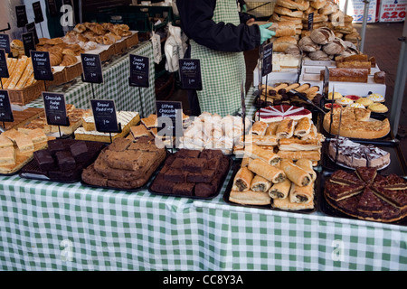 Pastry products on the market stall. Different semi healthy pastries ...