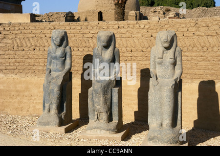 Statues of Goddess Sekhmet depicted with head of lioness and solar disk ...