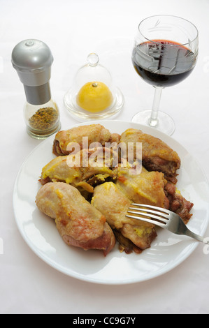 Fried chicken legs with spices on the board on a wooden table Stock ...