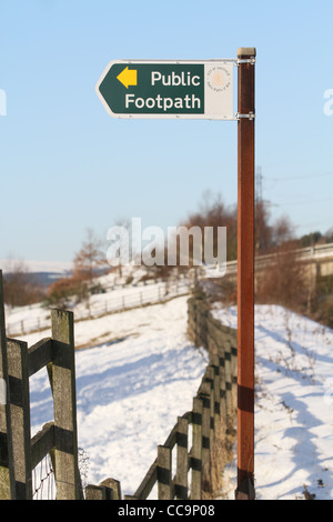 Public footpath sign in a snowy Wye Valley Stock Photo - Alamy