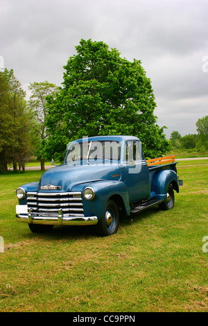 Chevrolet Thriftmaster pick-up truck car logo on a black vintage car ...
