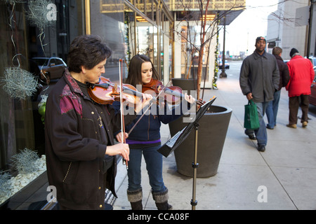 Street performers, violinists Chicago Illinois Stock Photo - Alamy