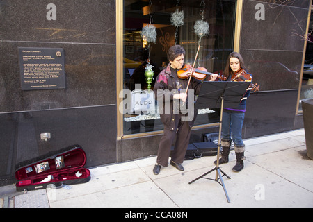 Street performers, violinists Chicago Illinois Stock Photo - Alamy