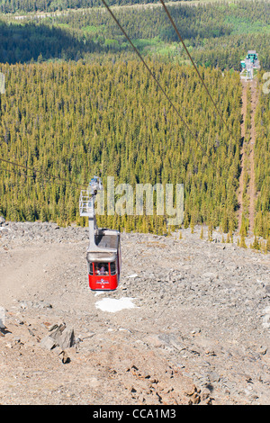 The Jasper tramway gondola approaches the upper terminal Stock Photo ...