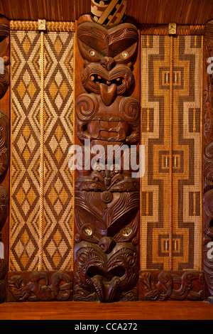 Maori Meeting House, wharenui, tekoteko on top, carved wood trim ...