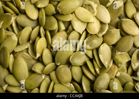 Hulled pumpkin seeds Stock Photo - Alamy