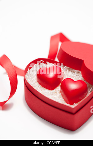 Red hearts, gift with ribbon and chocolates hearts flat lay, Valentine ...