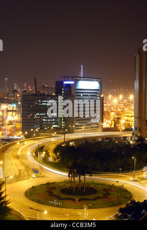 Evening traffic at a busy roundabout in Prague with illuminated ...