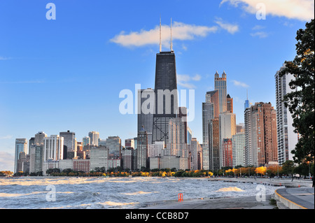 Chicago skyline at sunset viewed from North Avenue Beach Stock Photo ...