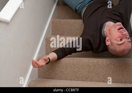 Man falling down the stairs. Accident of a man worker at the ...