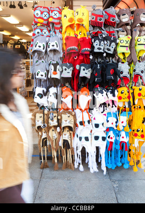 Various character trapper hats on display Stock Photo - Alamy