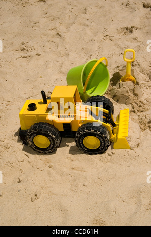 Childrens toys in a sand pit play area Stock Photo - Alamy