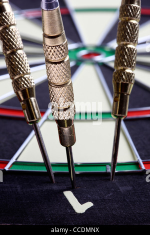 dartboard with darts Stock Photo - Alamy