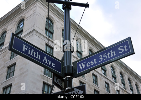Blue West 35th Street and Fifth Avenue historic sign in midtown ...