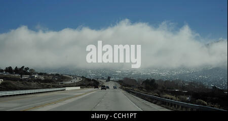 Drivers have clear weather along the 14 freeway after a winter snow ...