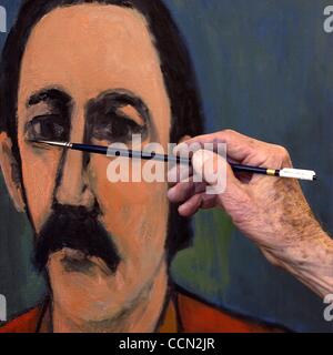 Alan Post works on perfecting his painting ''French Fireman,'' no. 4 at ...