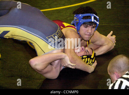 Liberty High's Anjdy Sanchez, top, wrestles beats Dominic Mutulo of ...