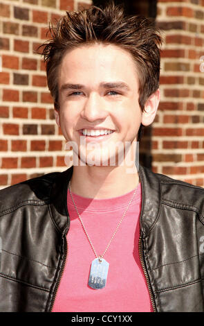 'American Idol' contestant AARON KELLY poses for photos at his ...