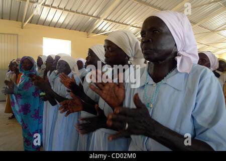 Apr 04, 2010 - Kauda, Sudan - Churchgoers sing and dance inside Upper ...