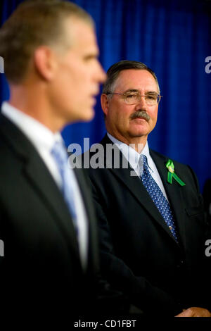 Secretary James Tilton, right listens to Matthew Cate, the new ...