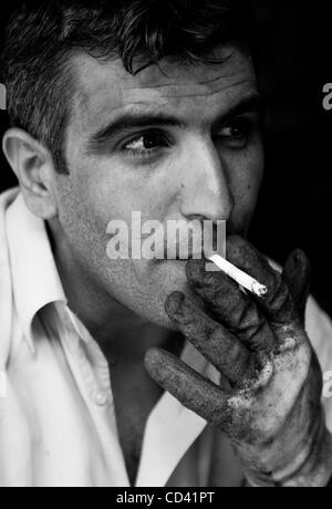 July, 14, 2008 - Diyarbair, Turkey - Blacksmith Memet Dal uses an ...