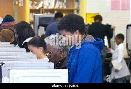 People cast their ballots during early voting on Saturday, Oct. 25 ...
