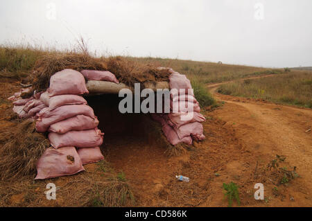 UXO Laos bomb disposal personnel using an Ebinger UPEX 740M metal ...