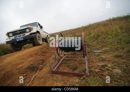 UXO Laos bomb disposal personnel using an Ebinger UPEX 740M metal ...