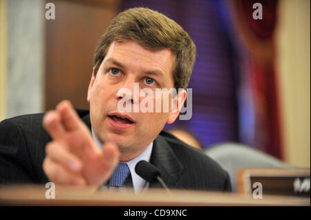 U.S. Sen. Mark Begich, D-Alaska, speaks with a woman at his campaign's ...