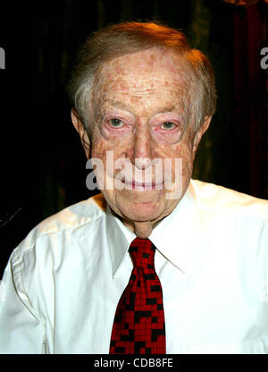 K34230JBU .ABE HIRSCHFELD SIGNS COPIES OF HIS NEW BOOK CRAZY AND IN ...