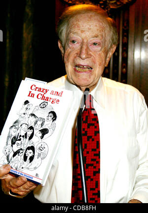 K34230JBU .ABE HIRSCHFELD SIGNS COPIES OF HIS NEW BOOK CRAZY AND IN ...