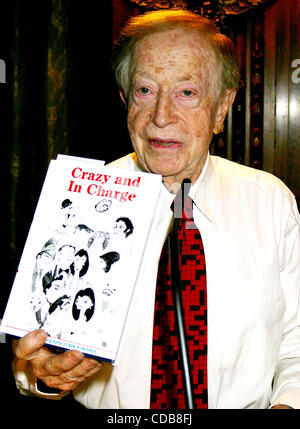 K34230JBU .ABE HIRSCHFELD SIGNS COPIES OF HIS NEW BOOK CRAZY AND IN ...