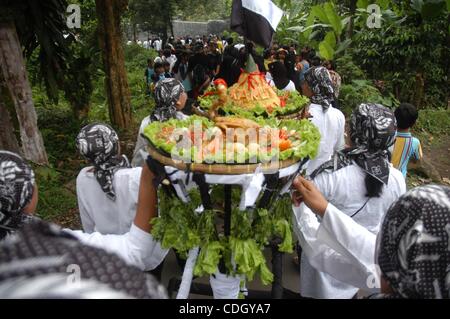 Jan 23, 2011 - Bogor, West Java, Indonesia - Villagers gather for ...