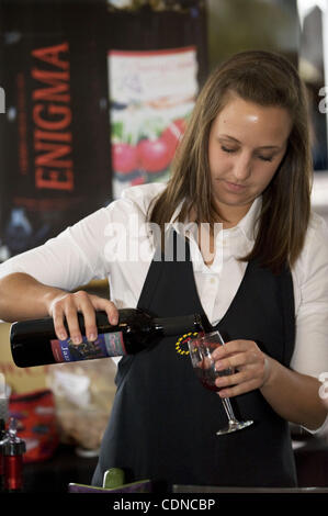 May 21, 2011 - Brooklyn, Michigan, U.S - George McAtee holds a bottle ...