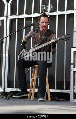 Mike Rodden of Hinder, performs on stage at the Molson Amphitheatre in ...