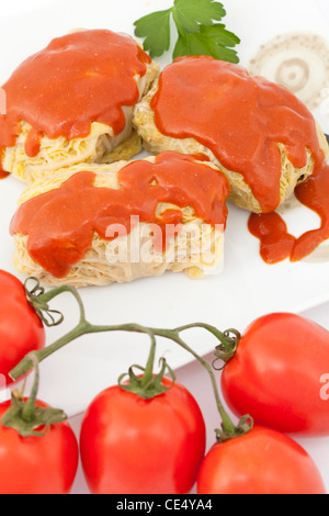 Stuffed Savoy Cabbage in Tomato Sauce Stock Photo - Alamy