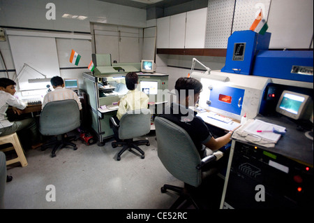 Laser cutting room. Rough diamonds are cut by a laser to make the a 90 ...