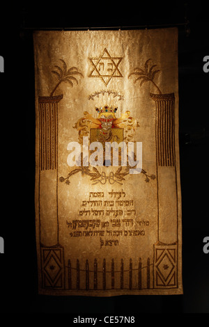 A parochet which is the curtain that covers the Torah Ark closet which ...