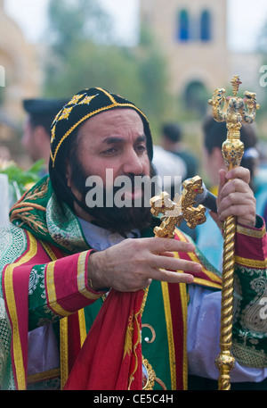 Christian Syrian Orthodox priest during Sunday Mass in the church "Mart ...