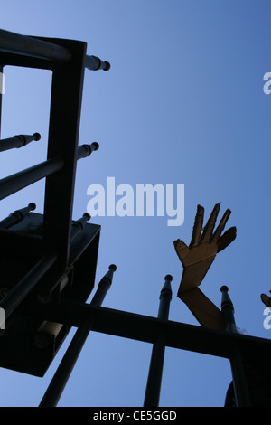 cardboard hand cutout by university college gate in rome italy Stock ...