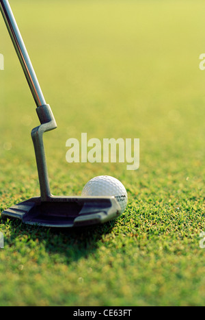 Golf ball on green grass ready to play at golf course. with copy space ...