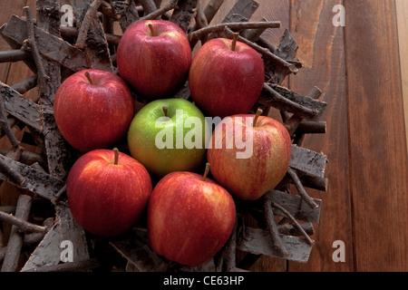 Fresh organic red and green apples in vintage box on wooden background ...